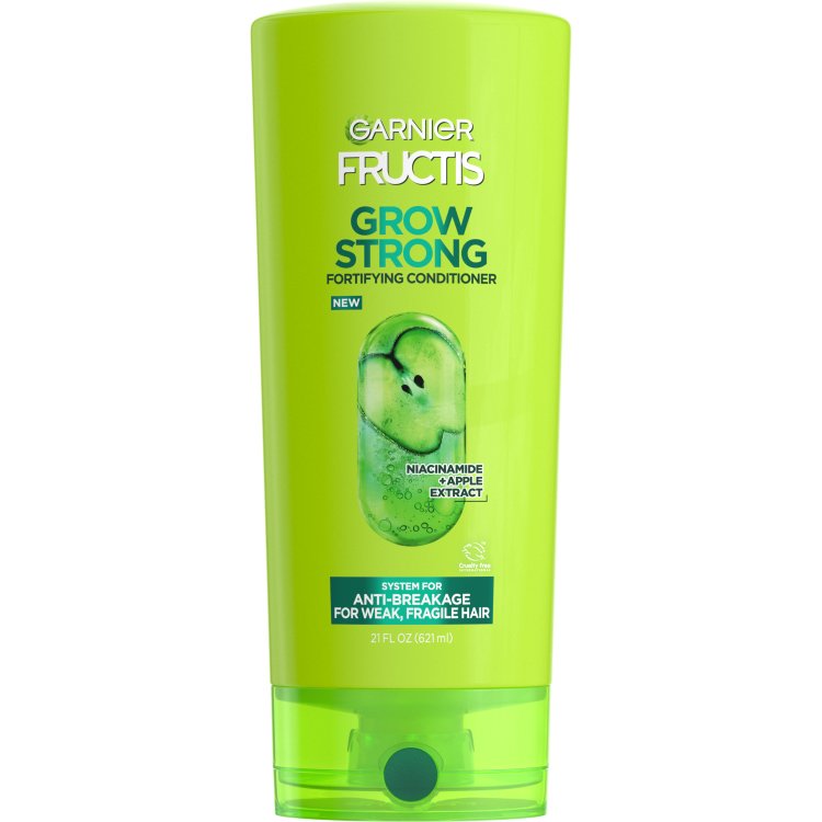 Detangle and style with Fructis Grow Strong Conditioner - Garnier